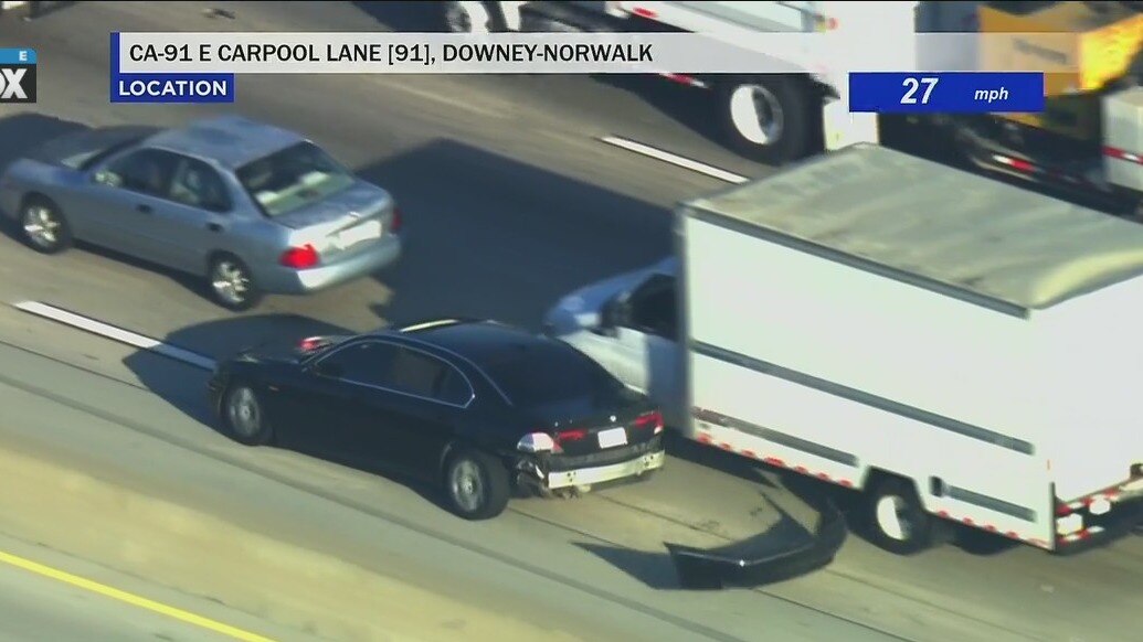 Pursuit driver loses bumper on the 91 Freeway during rush hour traffic ...